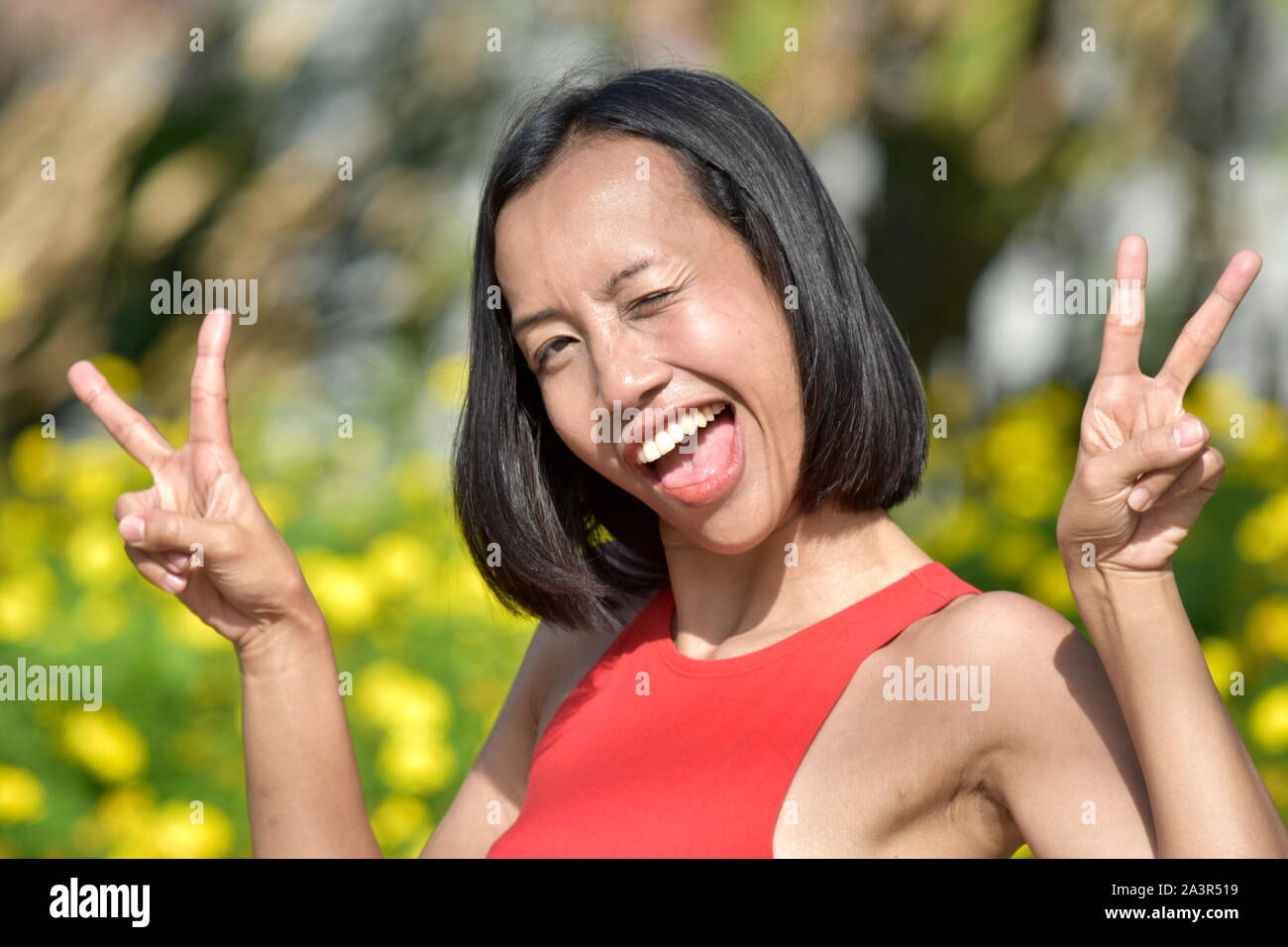 An Adult Female And Peace Sign Stock Photo - Alamy