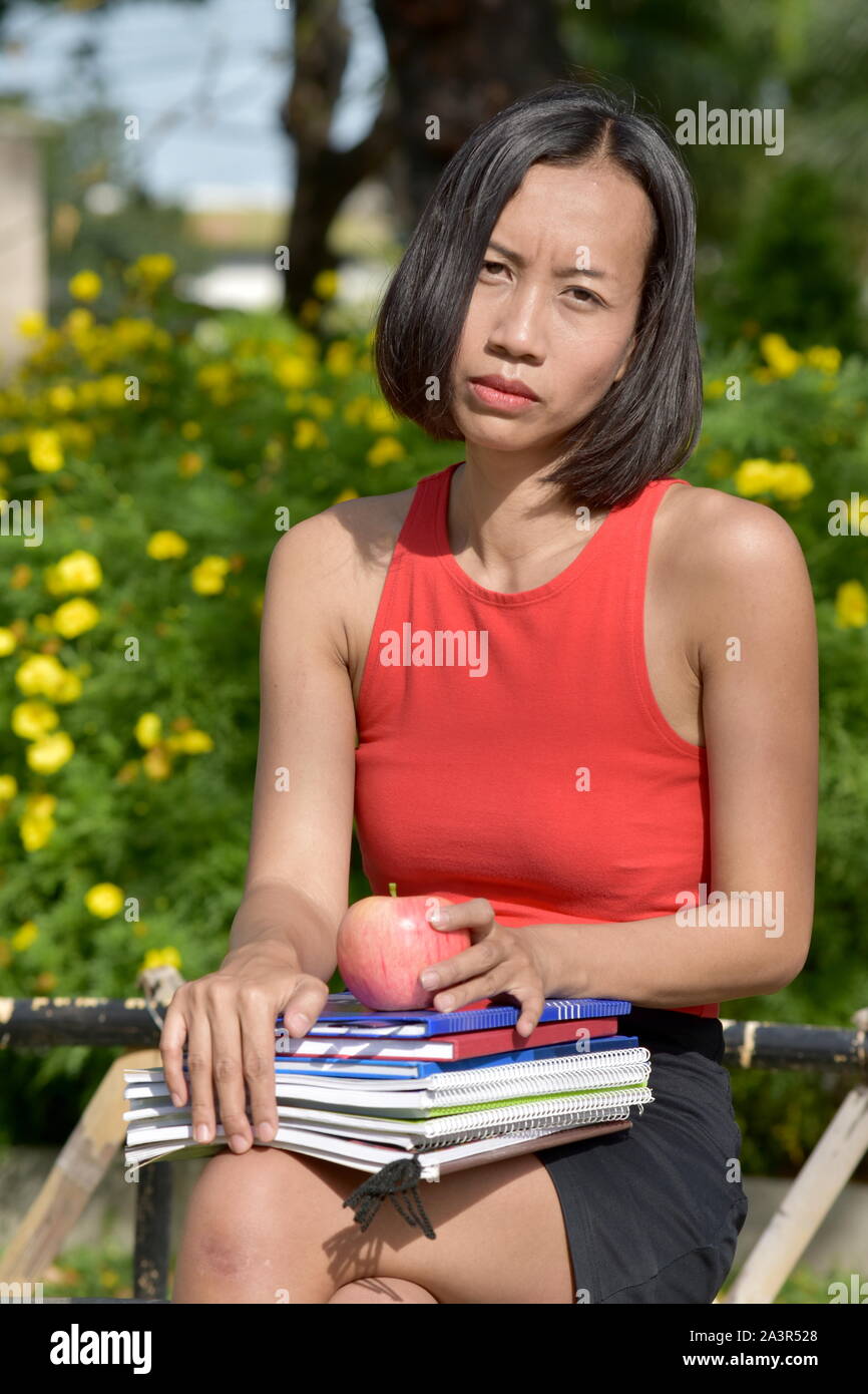 An Unhappy Female Teacher Stock Photo - Alamy