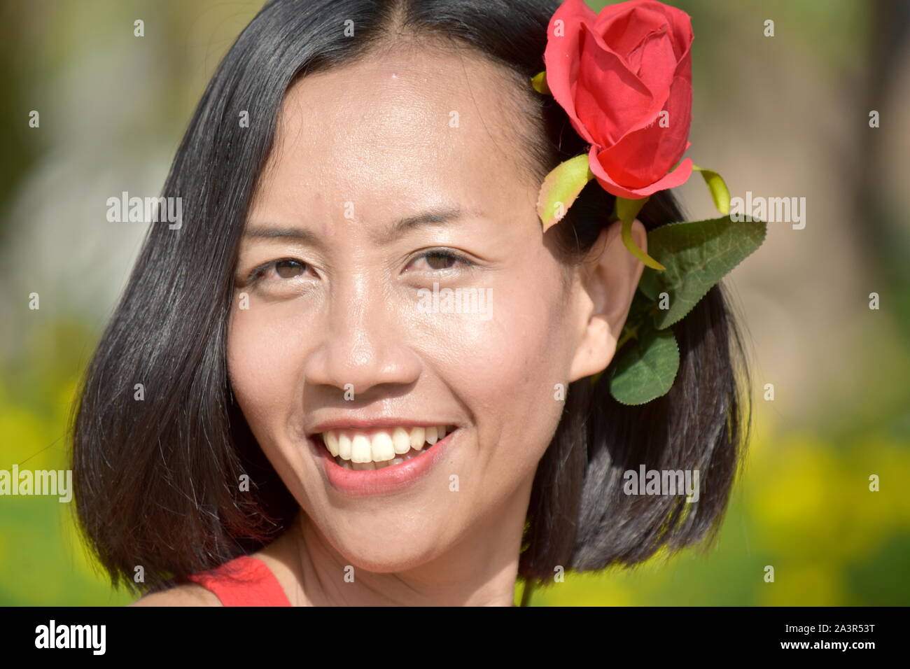Female And Happiness With A Rose Stock Photo - Alamy