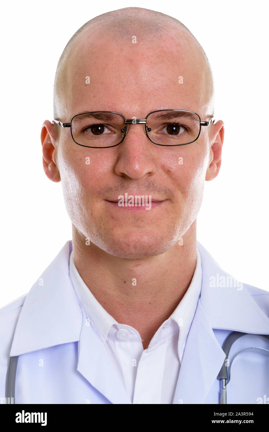 Face of young handsome bald man doctor wearing eyeglasses Stock Photo ...