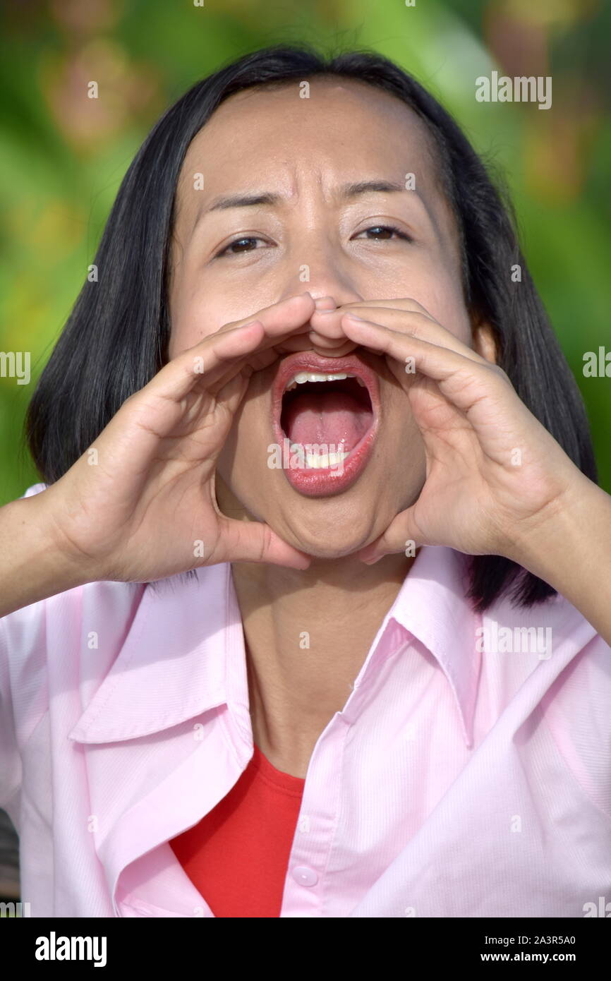 Youthful Filipina Female Yelling Stock Photo - Alamy