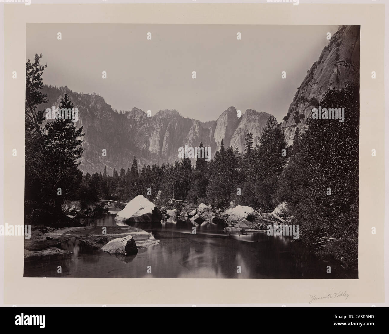 Stream with trees and mountains in background, Yosemite Valley, Calif ...