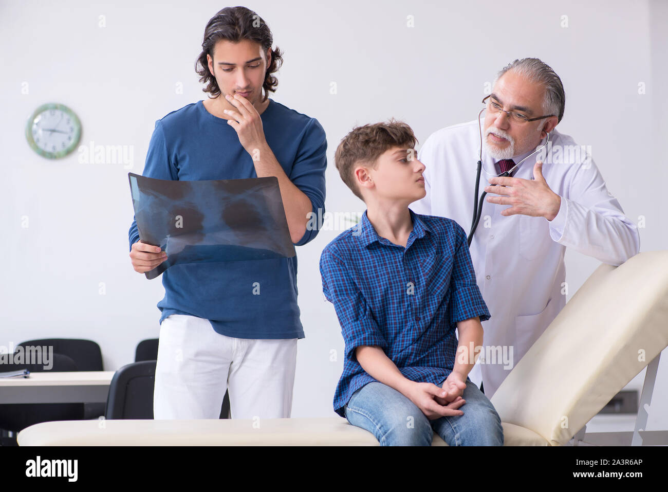 The young boy visiting doctor in hospital Stock Photo - Alamy