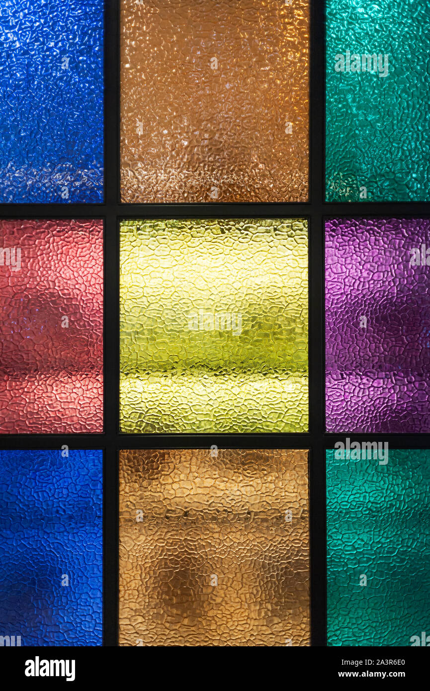Decorative window of various colored rectangles with light coming ...