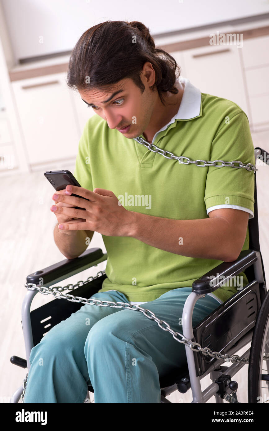 Restrained wheelchair hi-res stock photography and images - Alamy