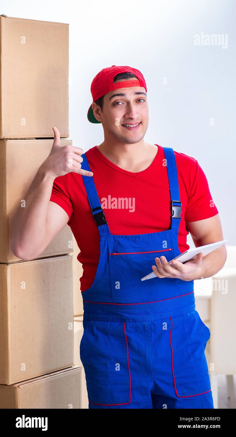 The contractor worker moving boxes during office move Stock Photo - Alamy