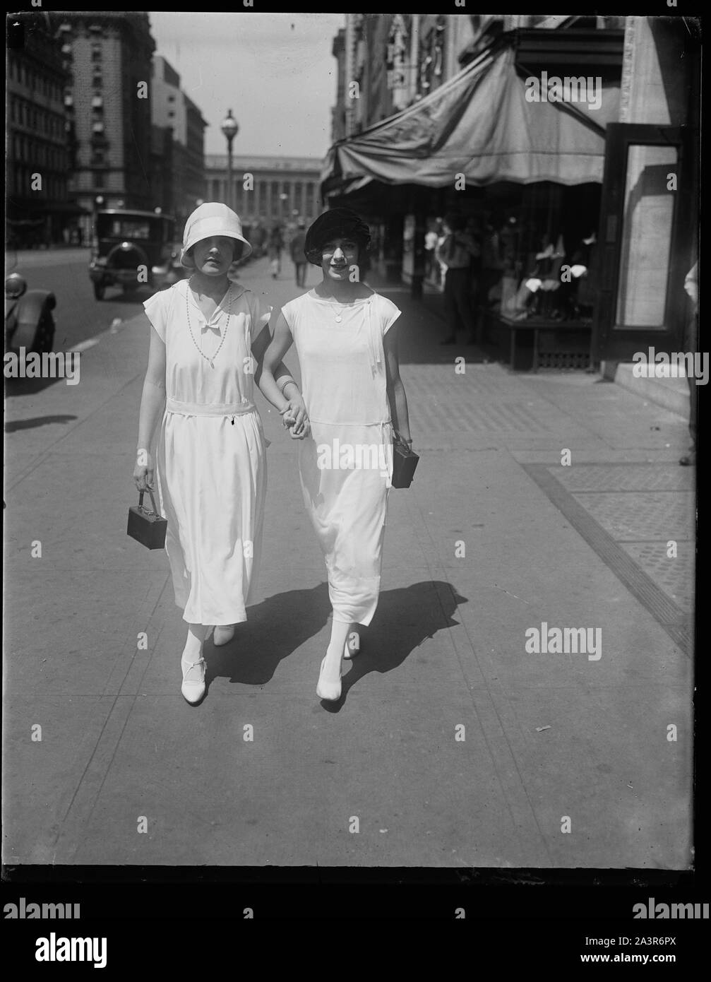 Sidewalk street scene Black and White Stock Photos & Images - Alamy
