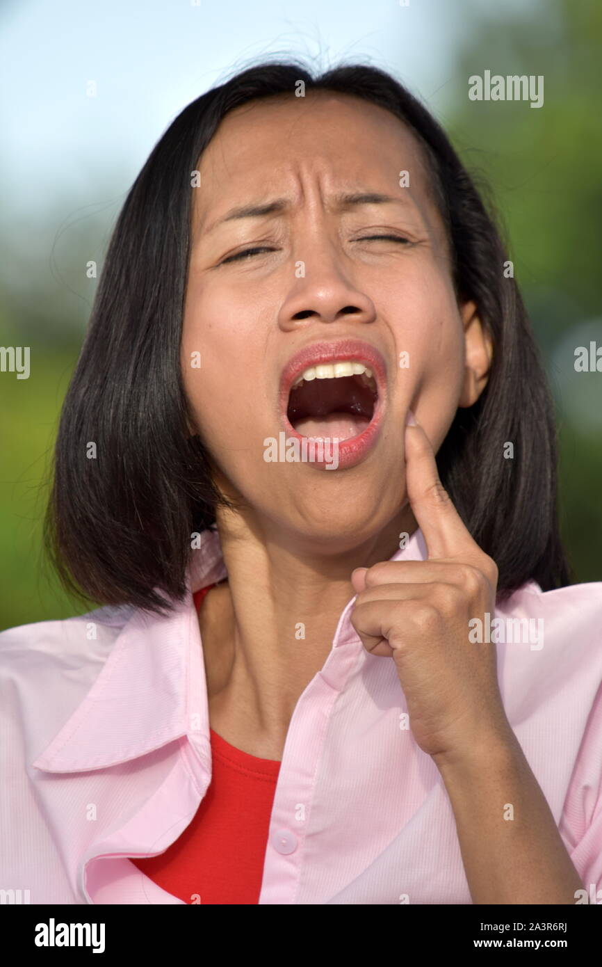 An Asian Woman With Toothache Stock Photo - Alamy