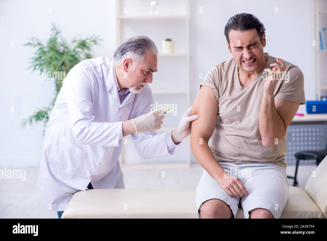 Scared male patient blood hi-res stock photography and images - Alamy