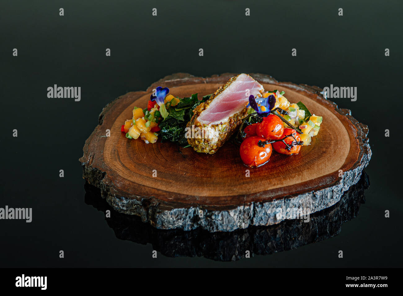 Roasted Tuna Steaks Crusted with Herbs and grilled vegetable and mango ...