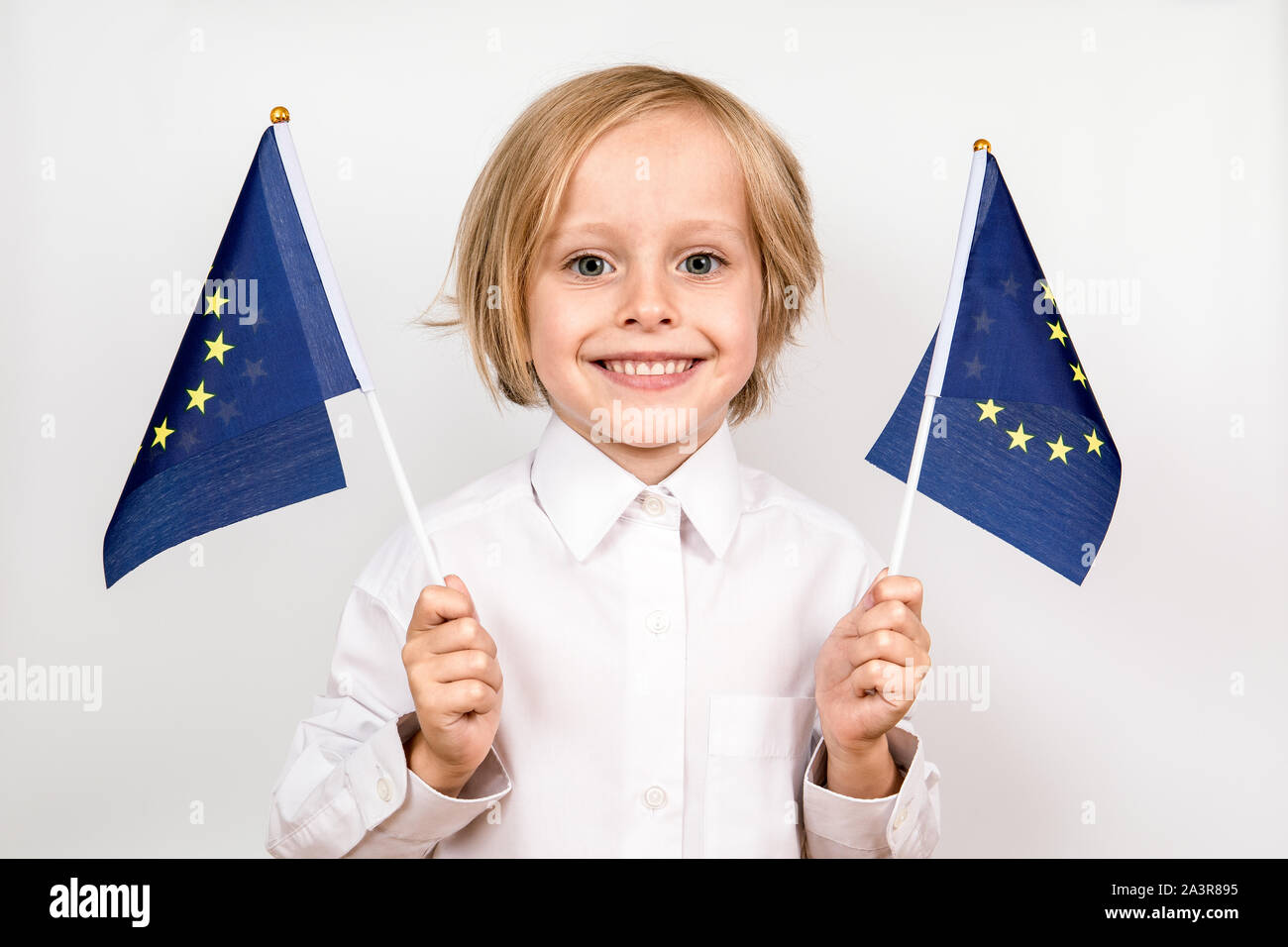 Boy with European Union flags. Europe future and celebration concept ...
