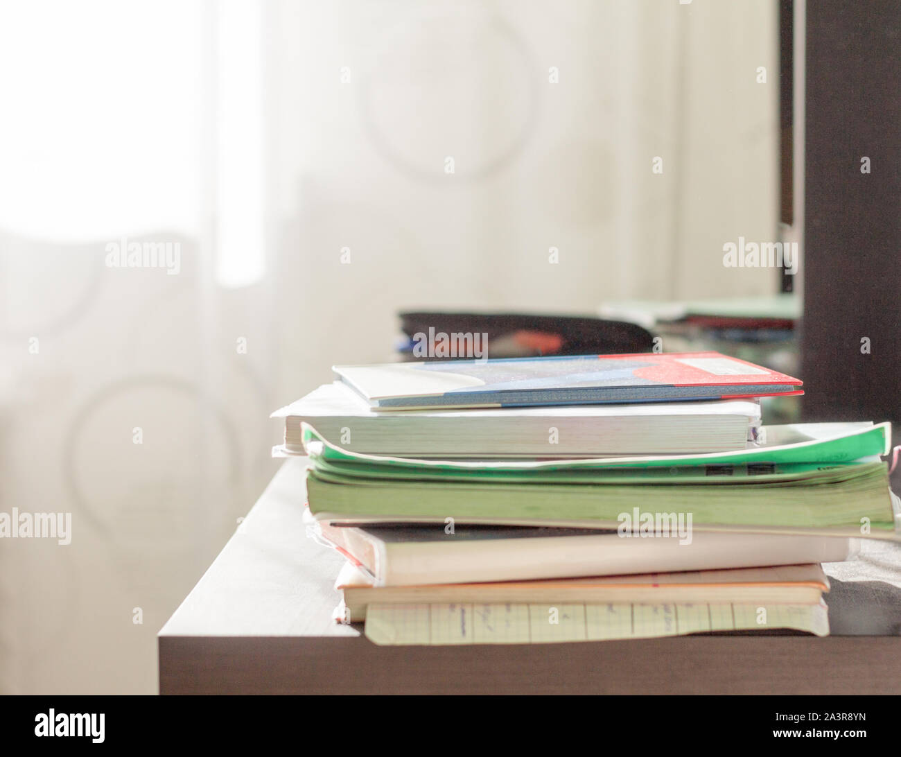 Textbooks on desk class stationery hi-res stock photography and images ...