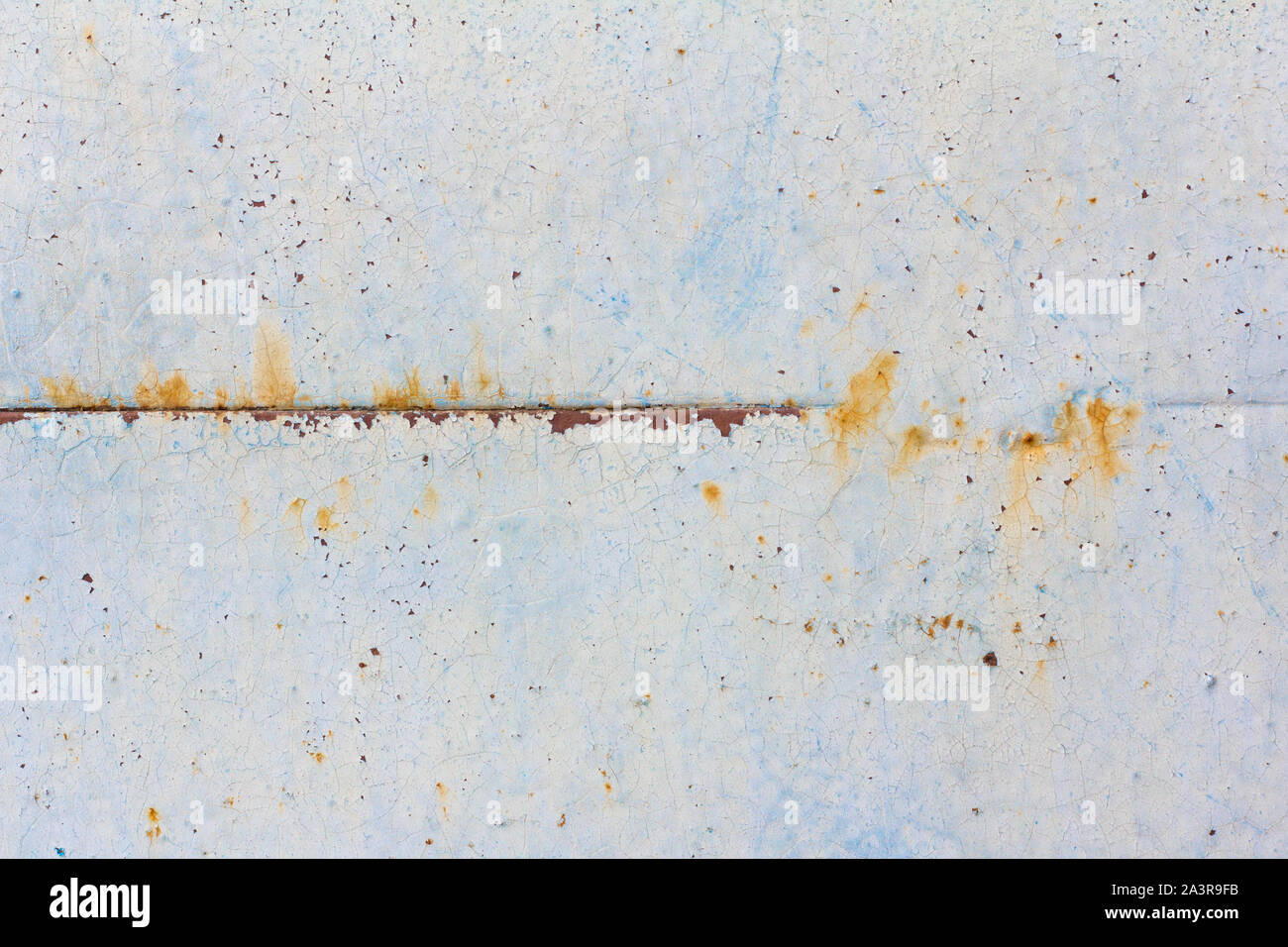 rust, the texture of a metal door with cracked paint and rust in the ...