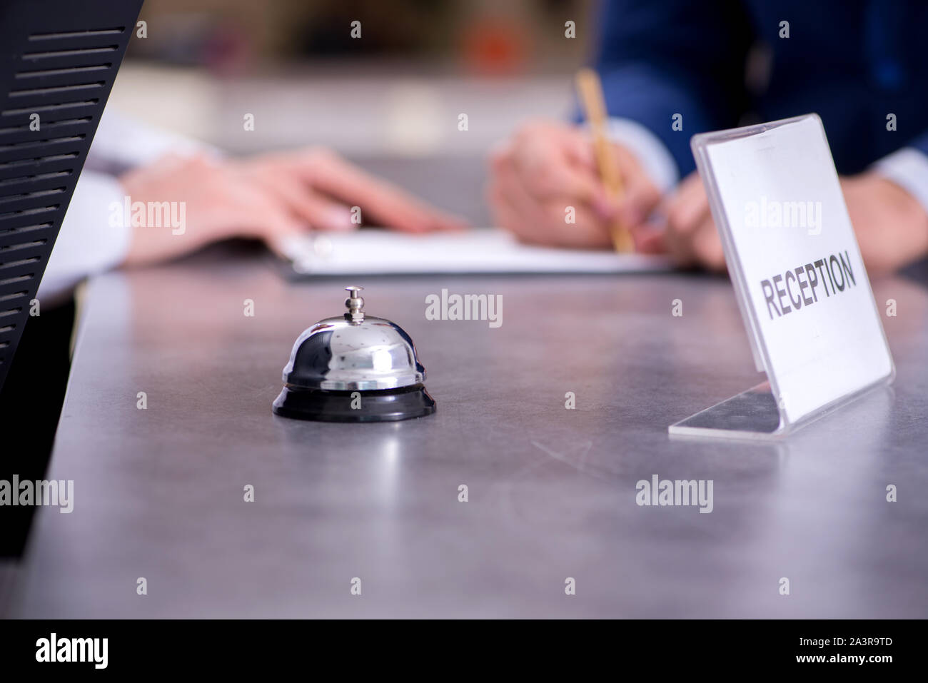 The hotel reception bell at the counter Stock Photo - Alamy