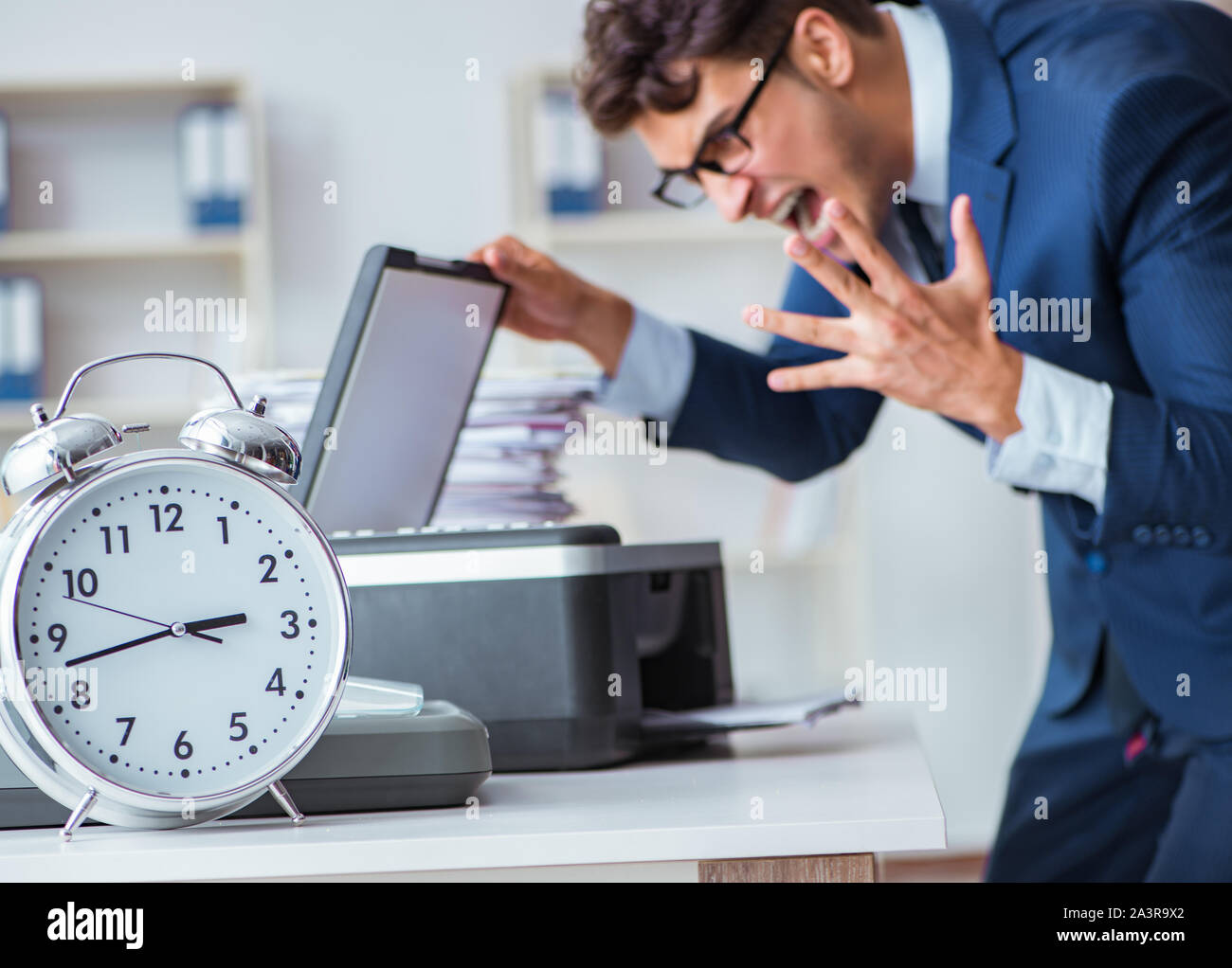 The businessman making copies in copying machine Stock Photo - Alamy
