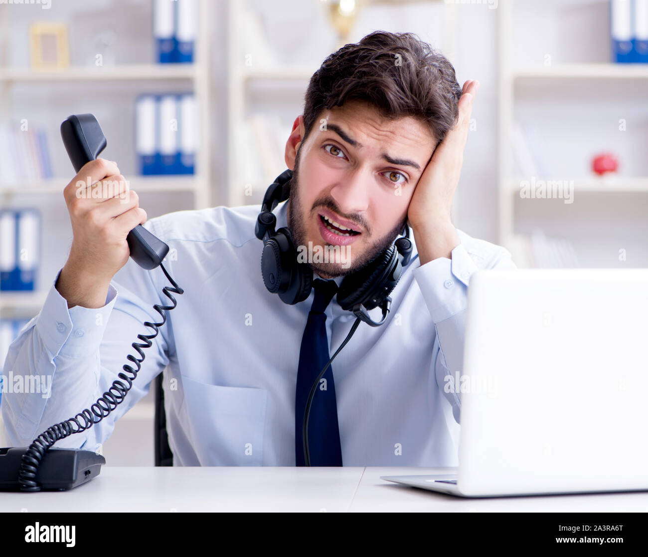 The call center employee working in office Stock Photo - Alamy