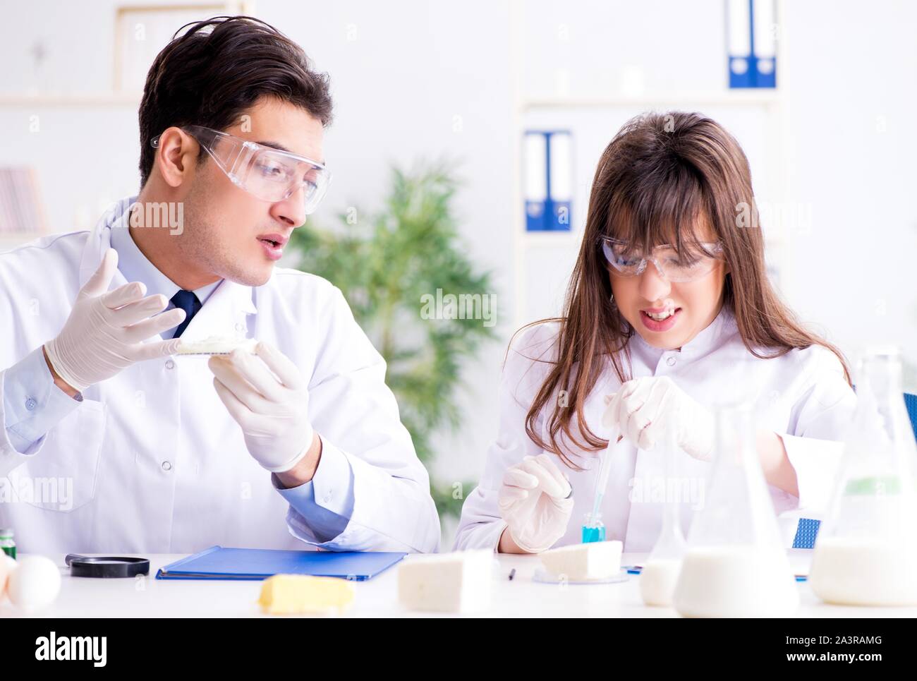The two lab doctor testing food products Stock Photo - Alamy