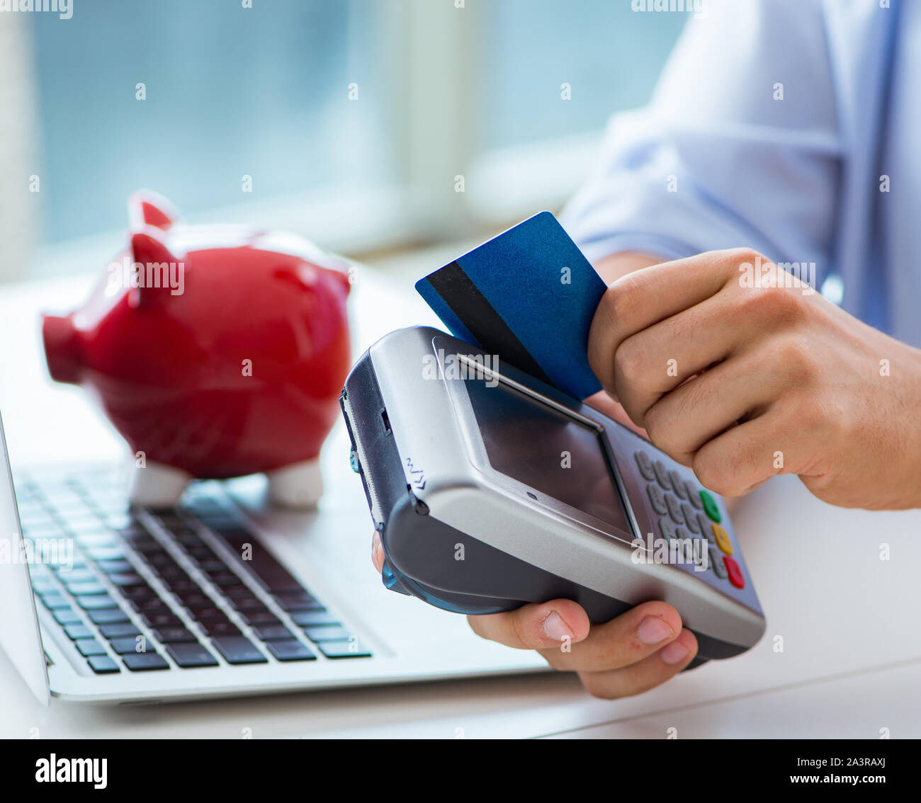 The man processing credit card transaction with pos terminal Stock ...