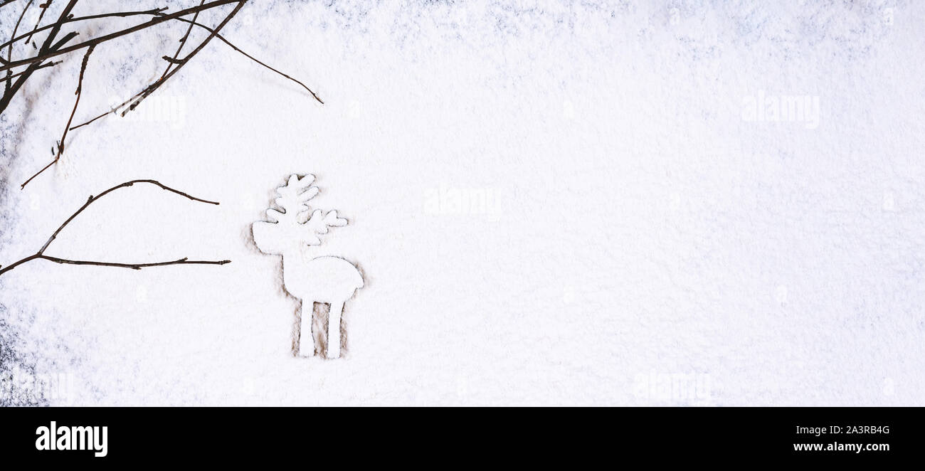 Christmas and holidays background. Silhouette of little deer in ...