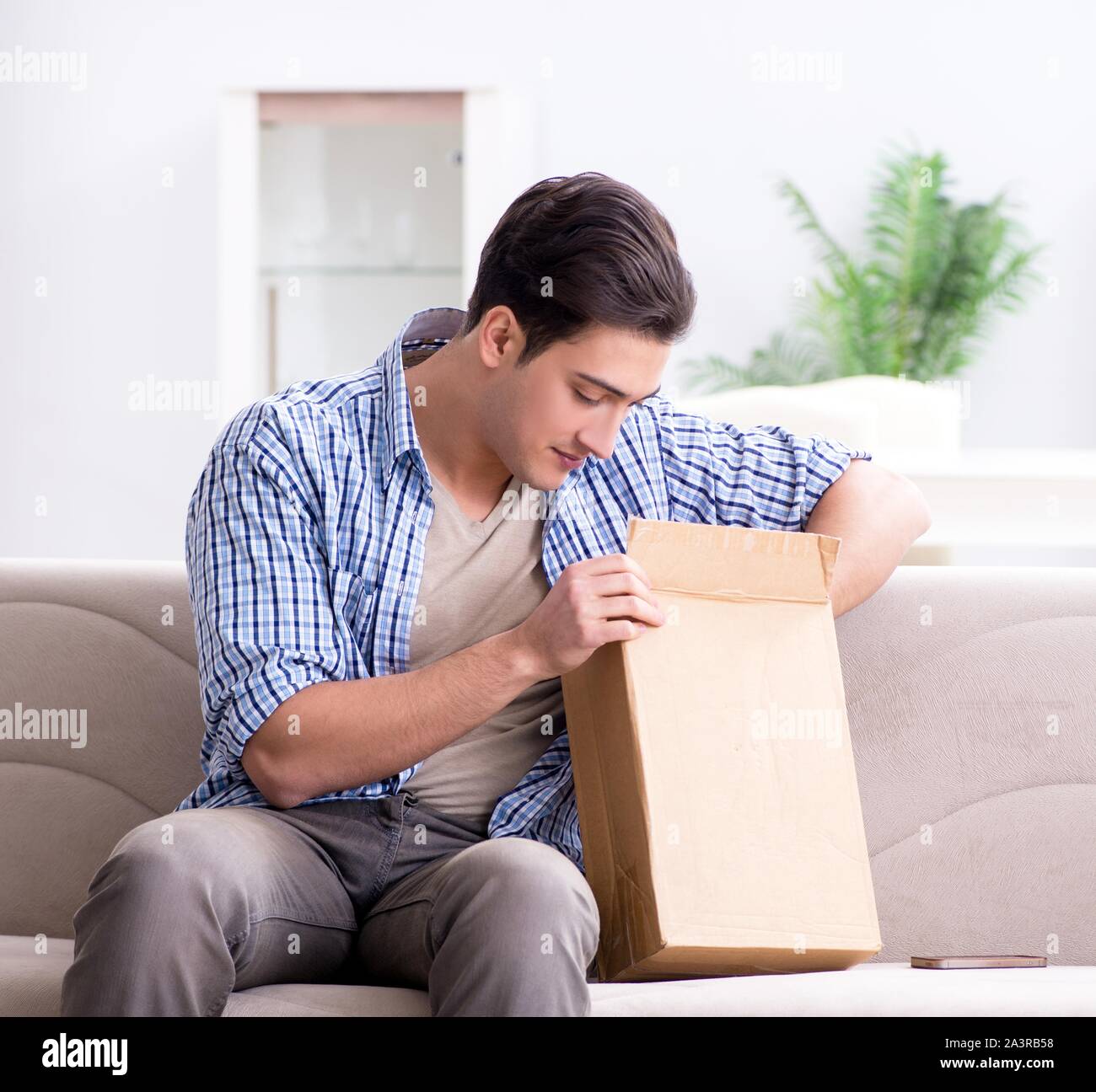 The man receiving empty parcel with stolen goods Stock Photo - Alamy