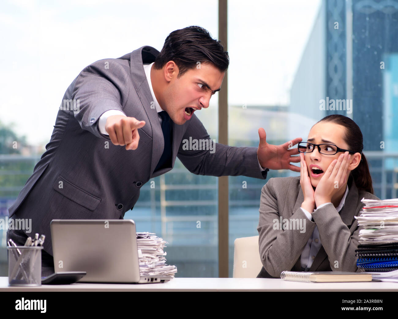 The boss yelling at his team member Stock Photo - Alamy
