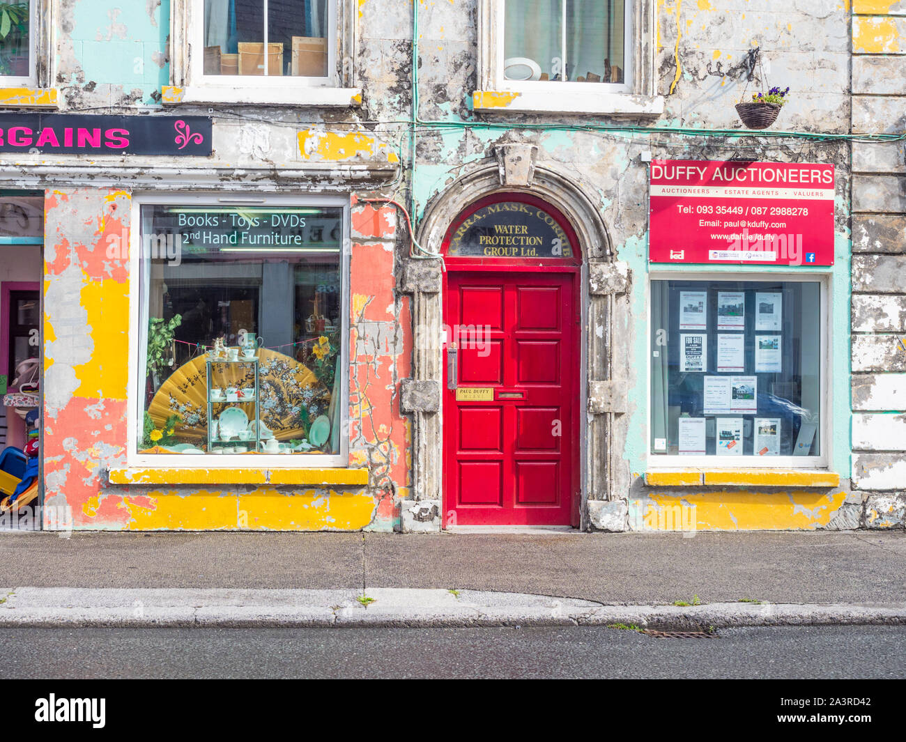 HEADFORD, IRELAND - AUGUST 6, 2019: Dilapidated but colorful shops and ...