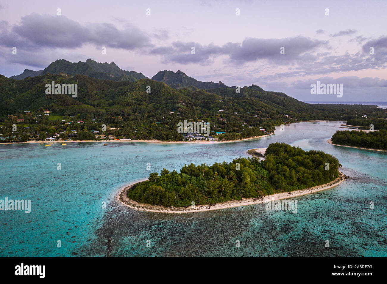 Aerial view of the sunrise over the stunning Muri lagoon and beach in ...
