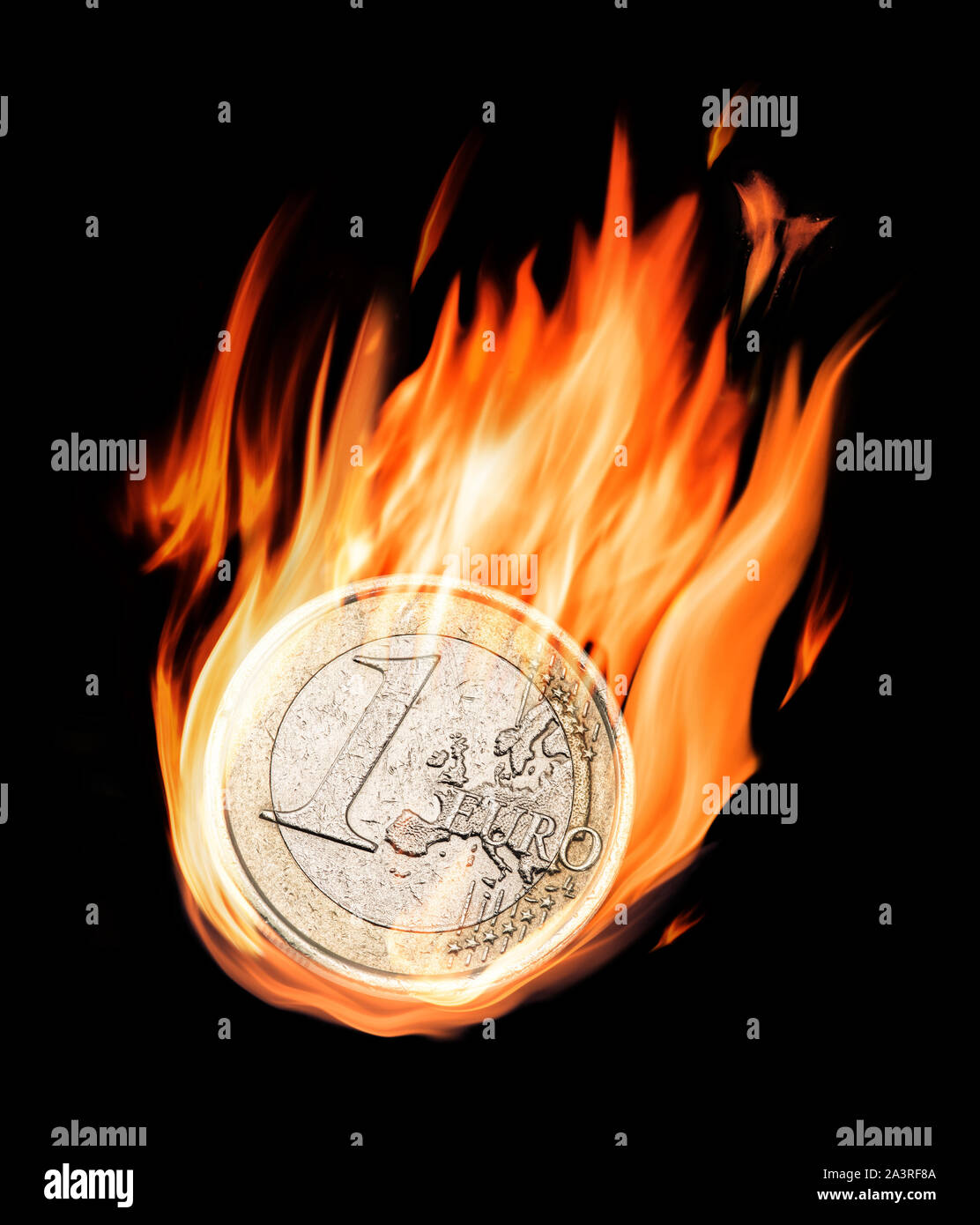 Burning one euro coin in flames on the black background. Conceptual ...