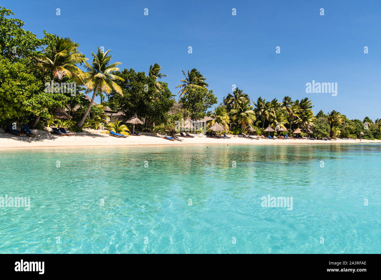 Idyllic turquoise water by an exotic beach in the Yasawa island in Fiji ...