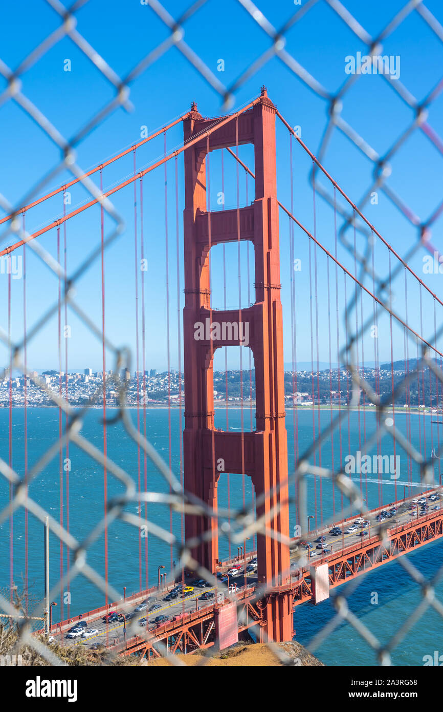 Iconic Golden Gate Bridge through a fence Stock Photo - Alamy