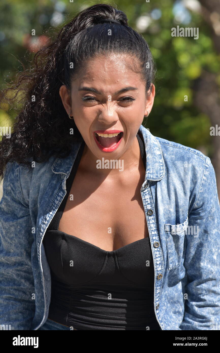 Mad Attractive Minority Adult Female Stock Photo - Alamy