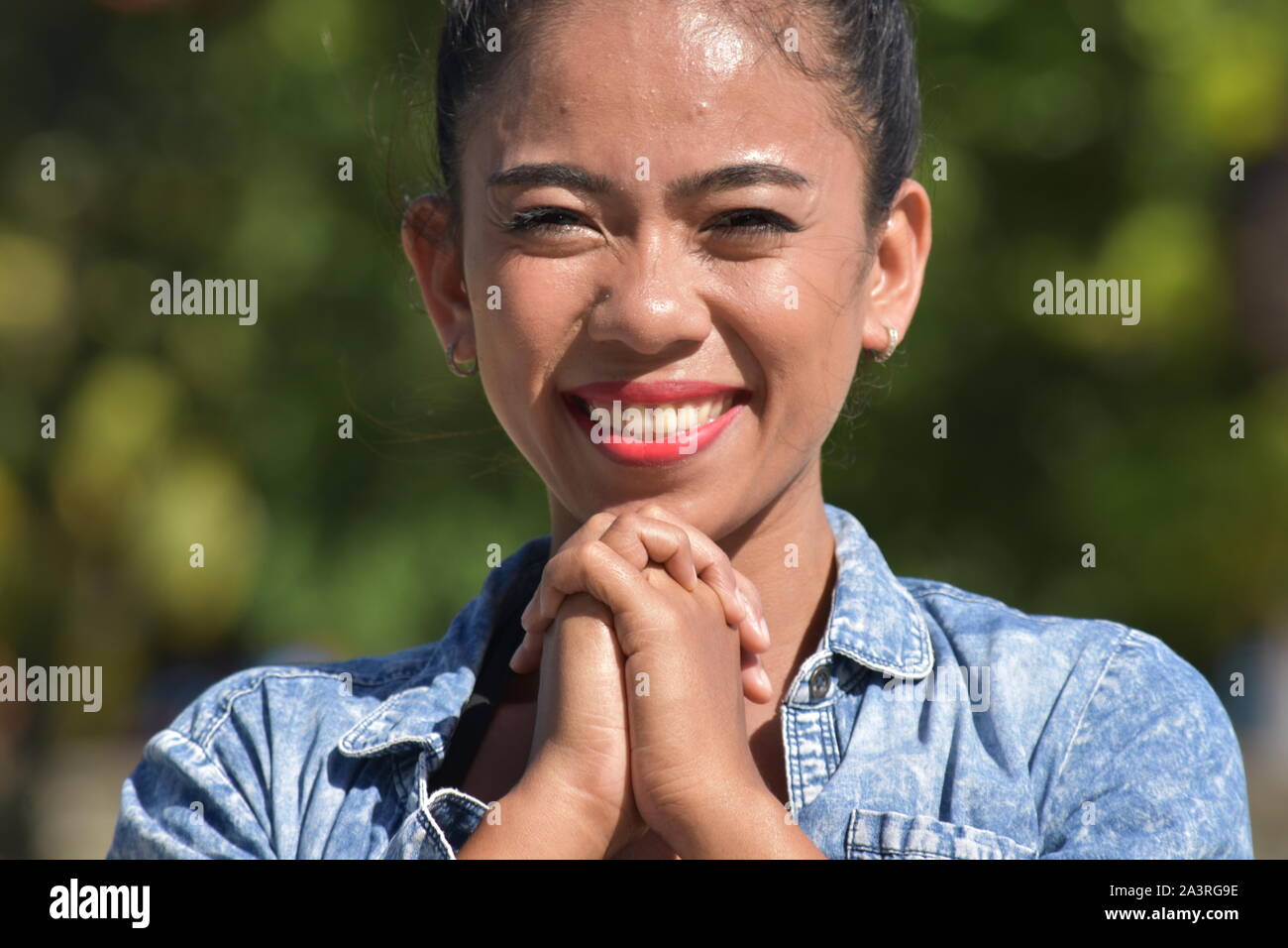 An Adult Female Praying Stock Photo - Alamy