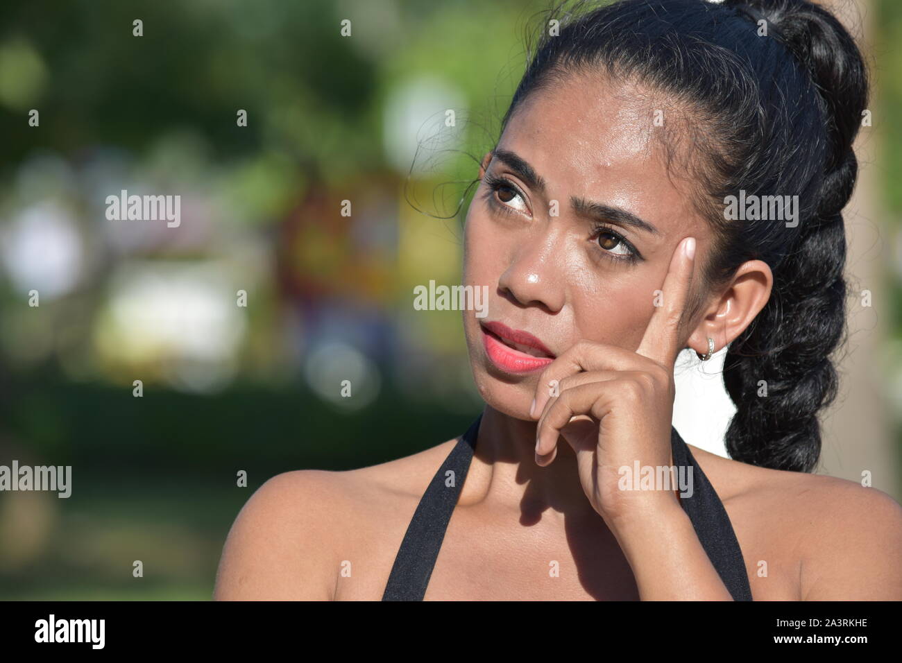 Minority Adult Female Making A Decision Stock Photo - Alamy