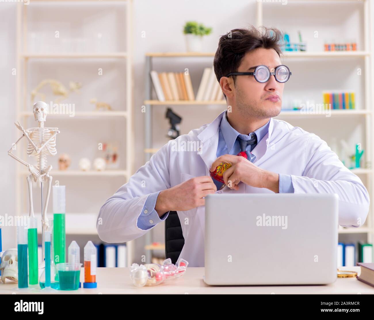 The funny doctor having fun in hospital lab Stock Photo - Alamy