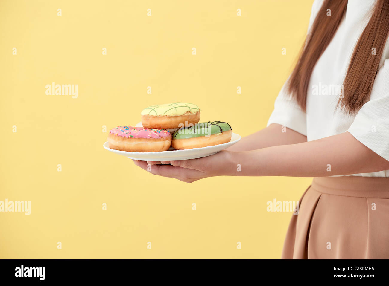 Asian girl show and holding plate full of tasty delicious aromatic ...