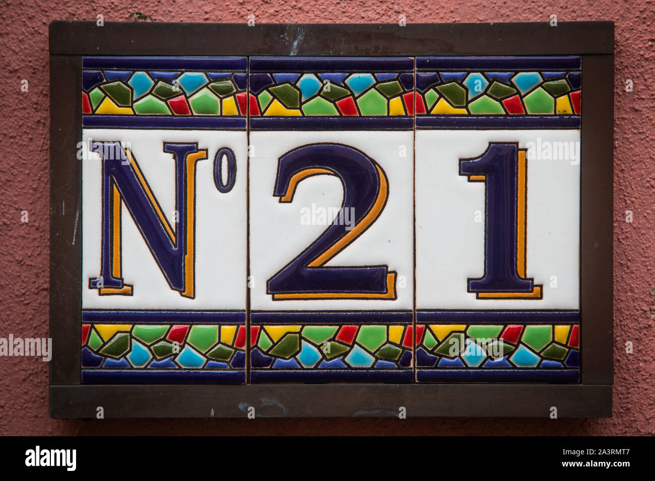 House number with number twenty one, on a wall Stock Photo - Alamy