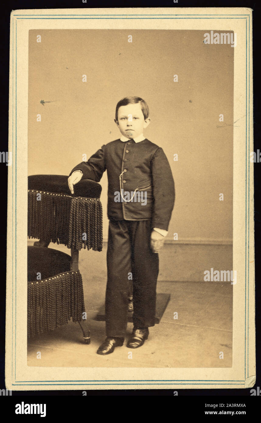 Leaning against a chair hi-res stock photography and images - Alamy