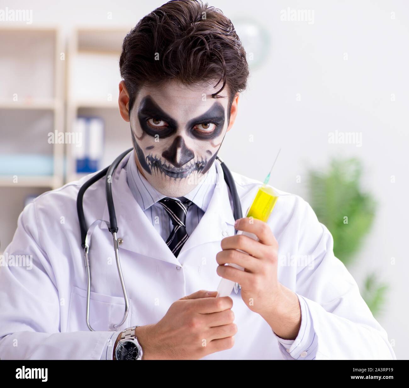 The scary monster doctor working in lab Stock Photo - Alamy