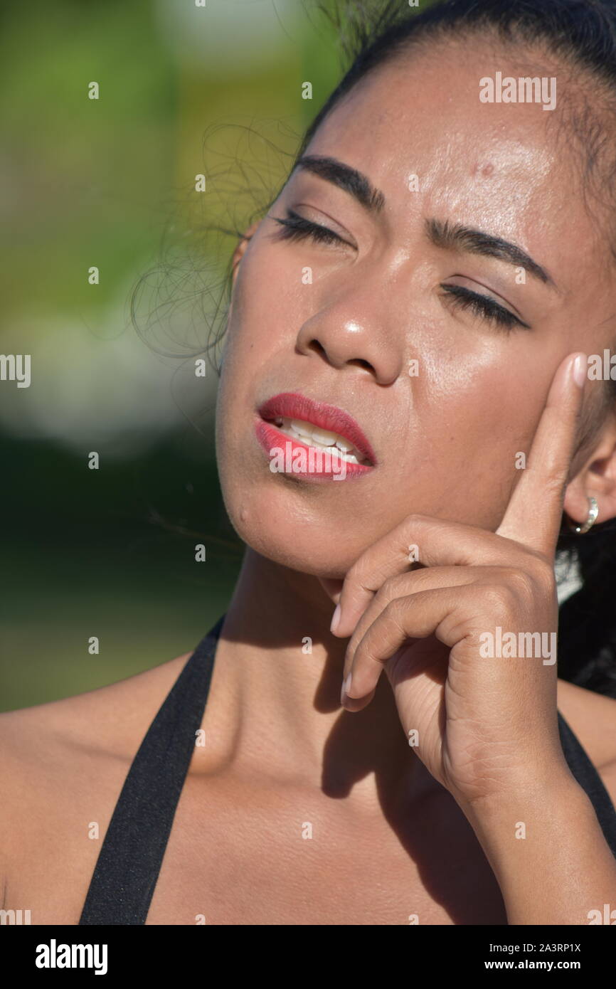 Young Asian Female Thinking Stock Photo - Alamy