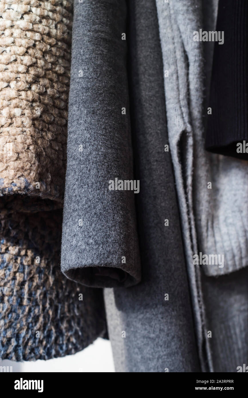 Texture of autumn women clothes sweaters and coats. Baclground, close ...