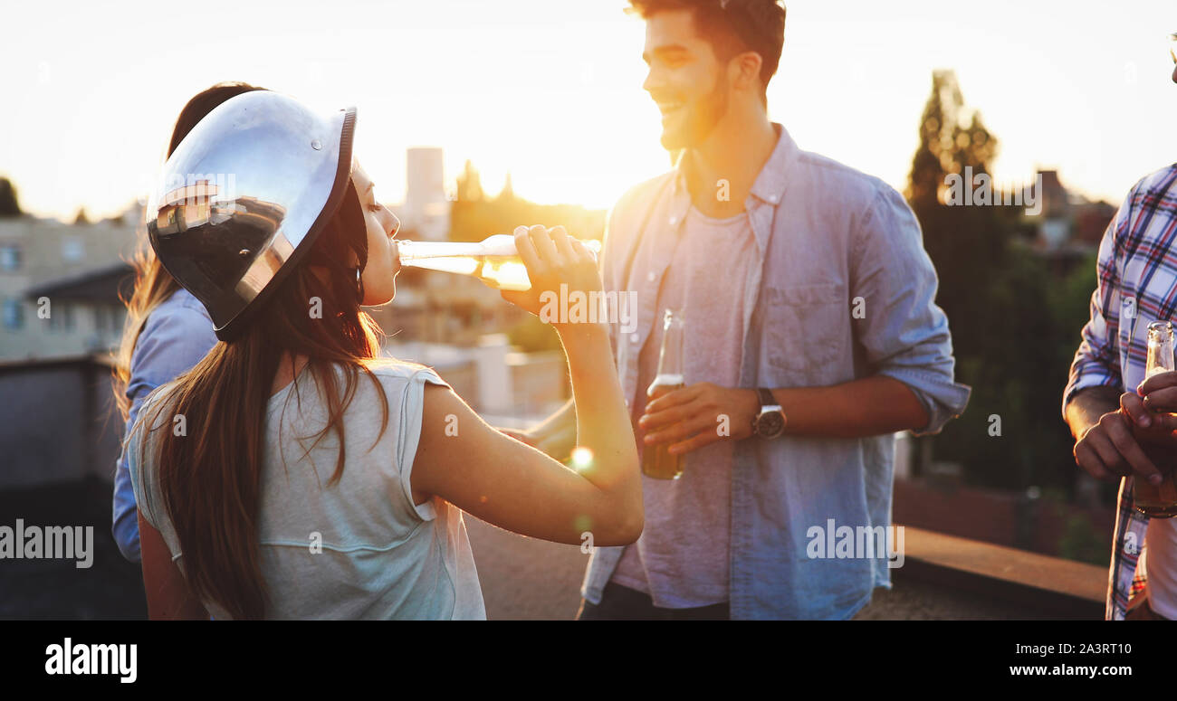 Happy cheerful friends spending fun times together Stock Photo - Alamy