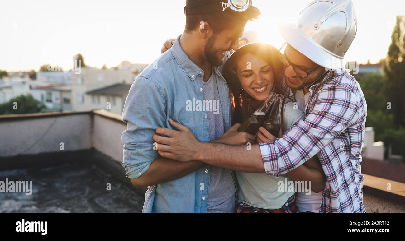 Happy cheerful friends spending fun times together Stock Photo - Alamy