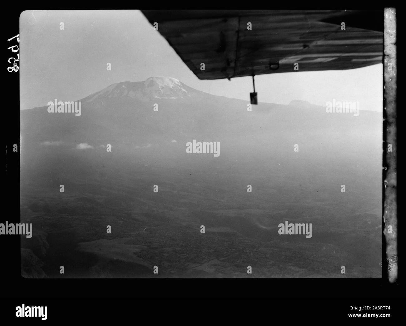 Tanganyika. En route to Arusha. Air view. Mount Kilimanjaro as seen ...