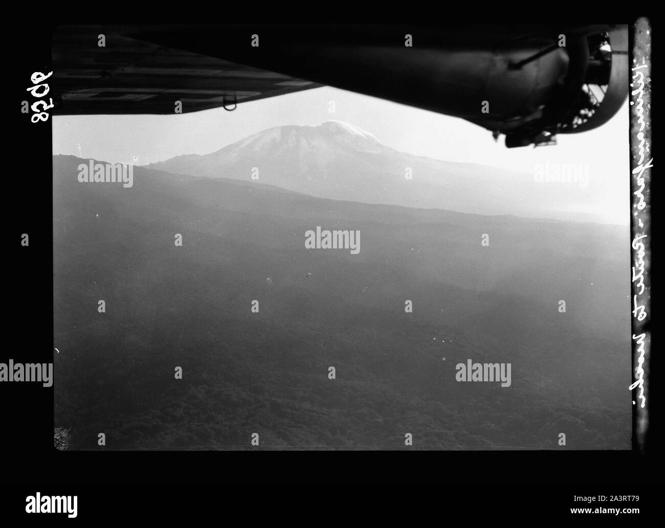 Tanganyika. En route to Arusha. Air view. Mount Kilimanjaro as seen ...