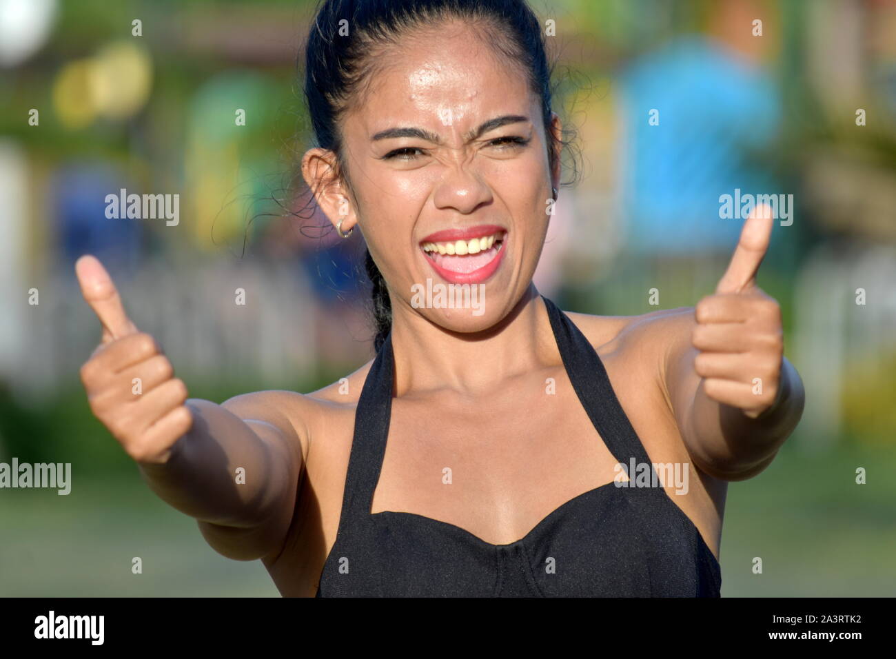 Female With Thumbs Up Stock Photo - Alamy
