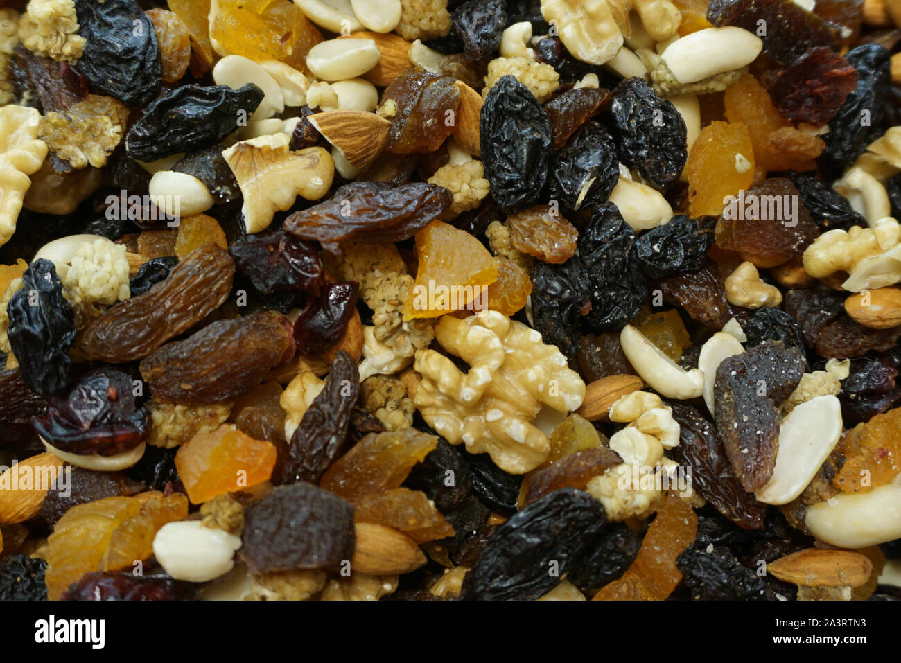 Assortment of mixed dry fruits and nuts, texture background Stock Photo ...