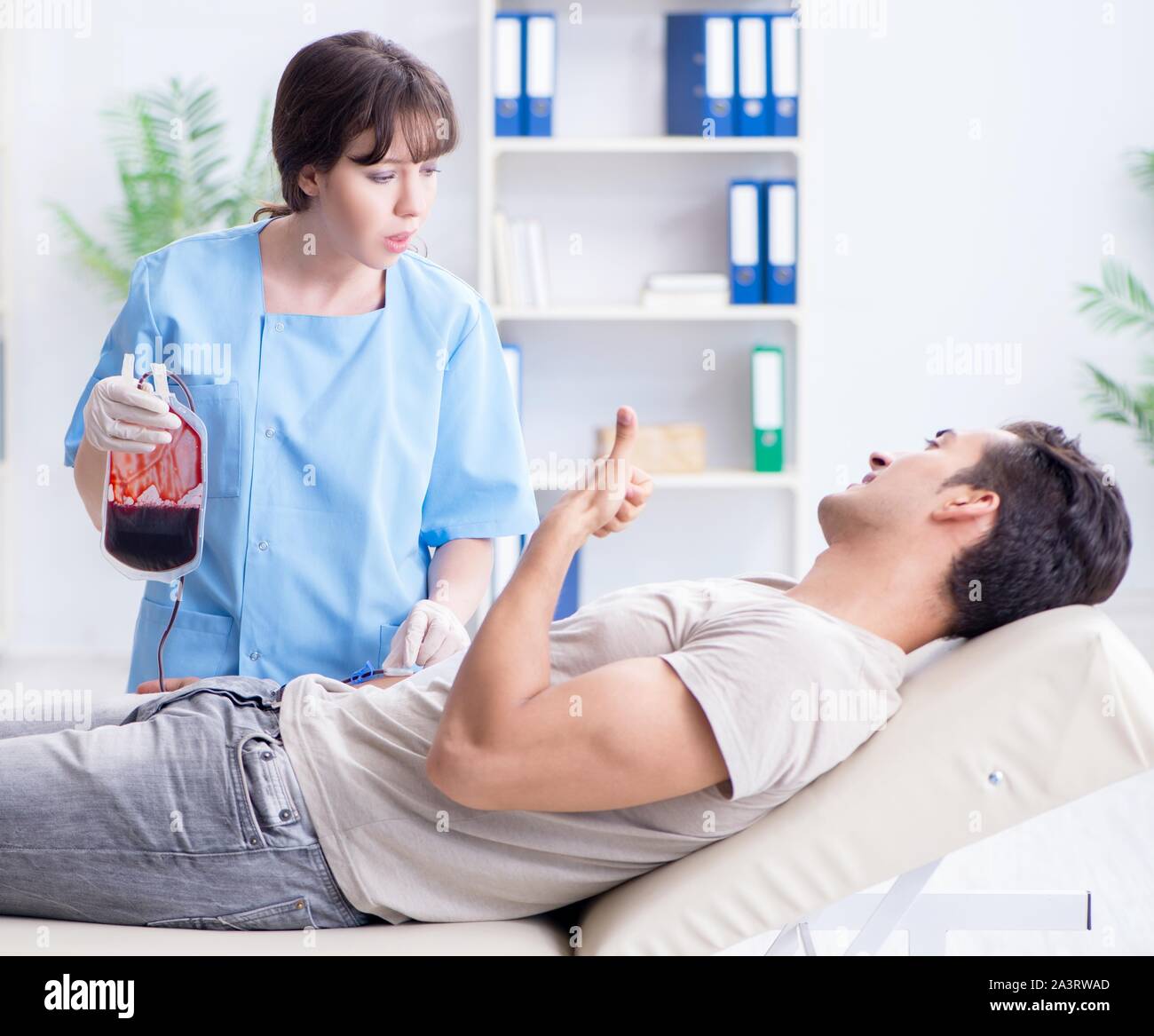 Patient getting blood transfusion in hospital clinic Stock Photo - Alamy