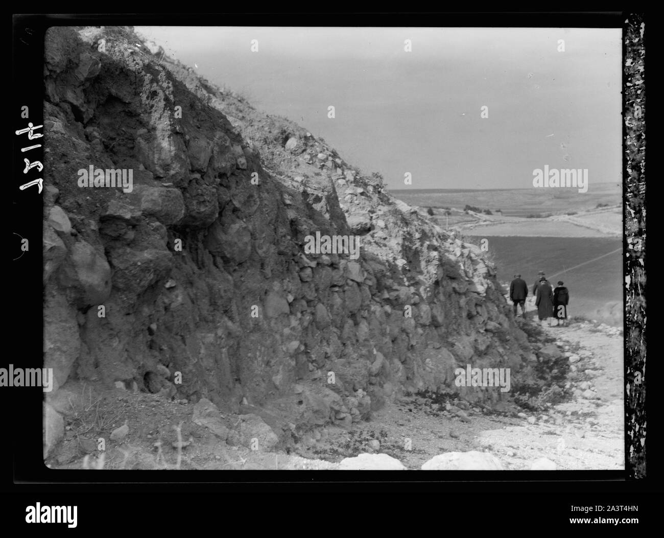 Tel Deweir (Lachish). E. side of Iron Age revetment, built in three ...