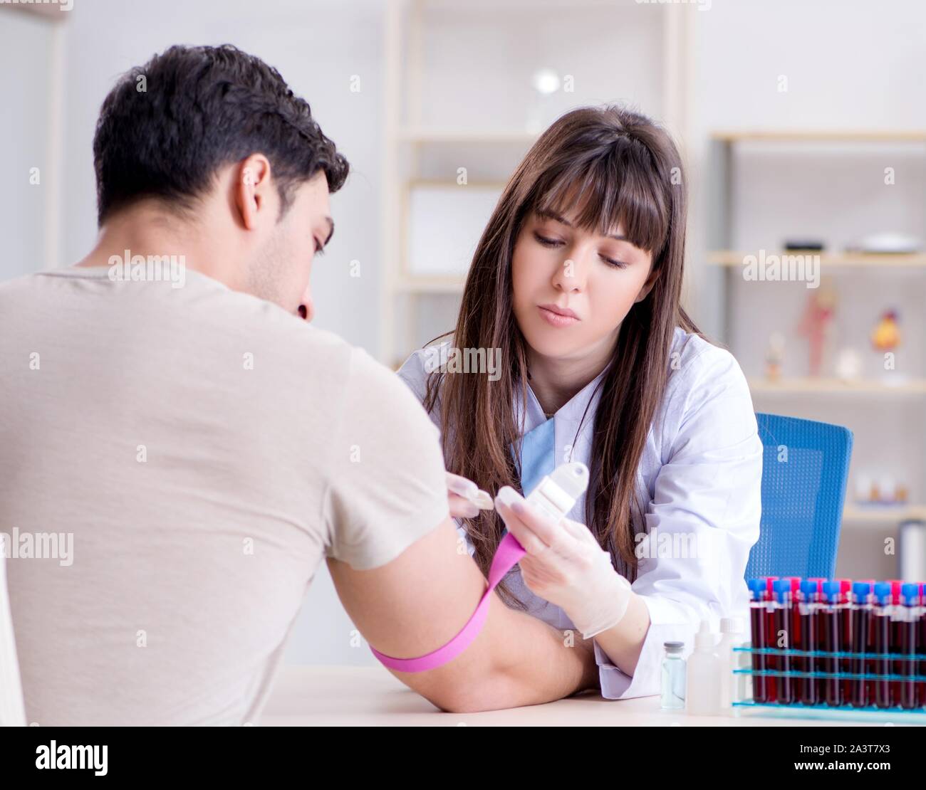 The patient during blood test sampling procedure taken for analysis ...
