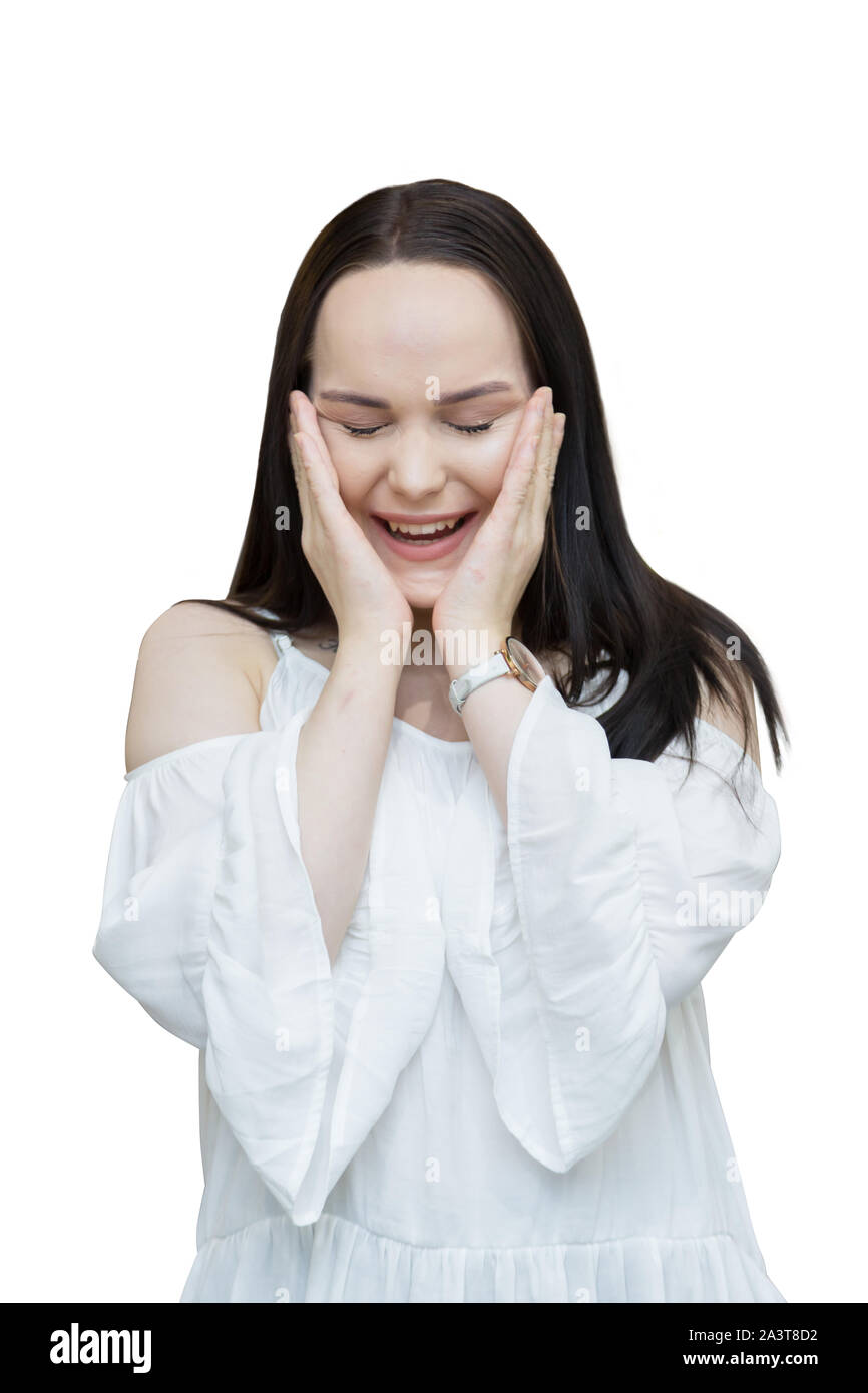 Young woman making facial expressions on a white isolated background ...